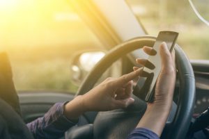 Texting and Driving: Stats and Solutions - Defensive Driving
